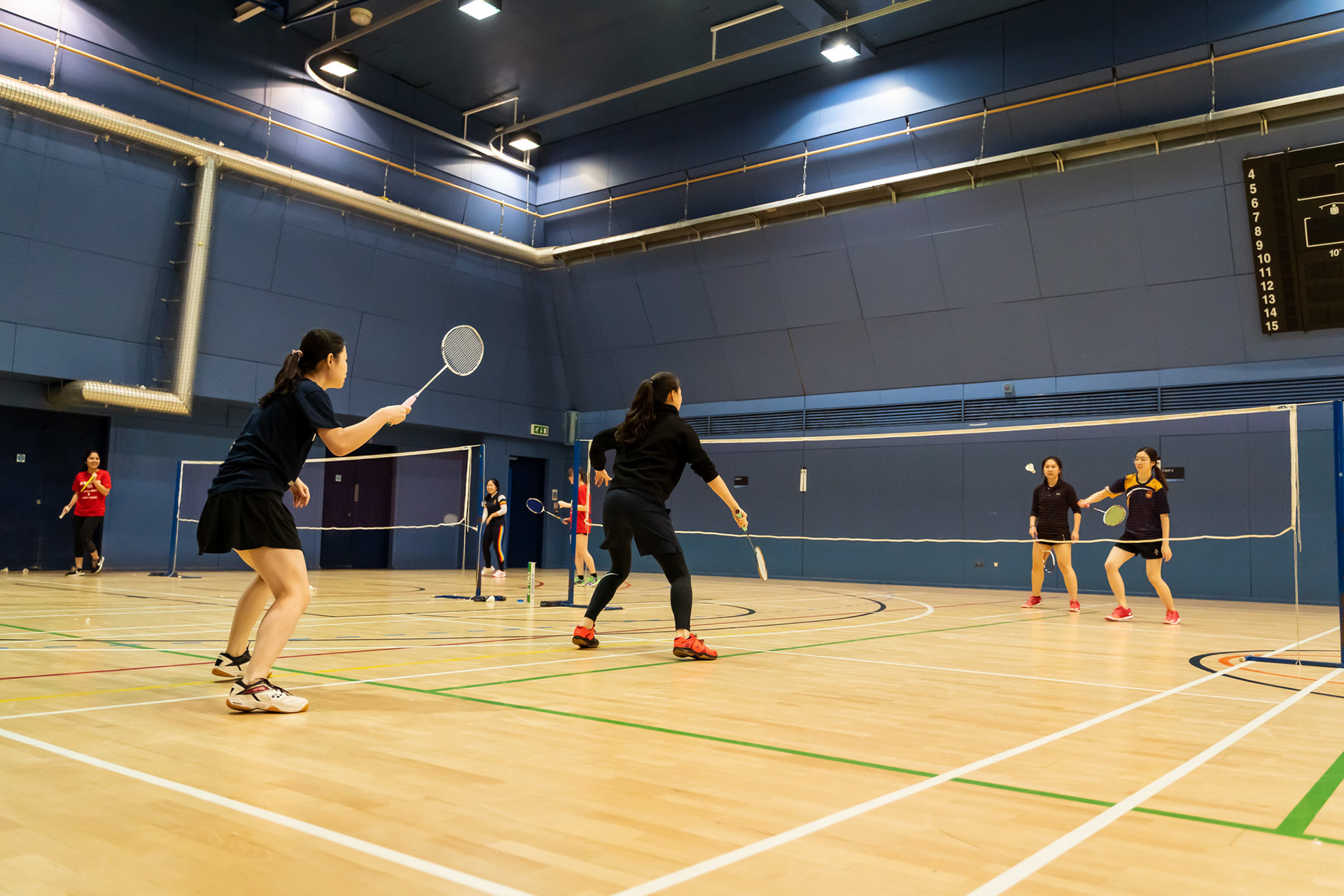 AlekZiol Photography - Varsity Badminton